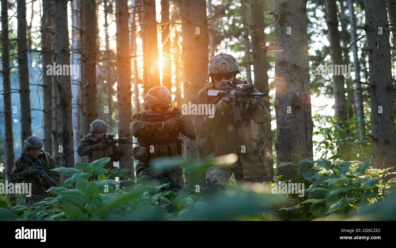 Modern warfare Soldiers Squad Running as Team in Battle Formation Stock ...