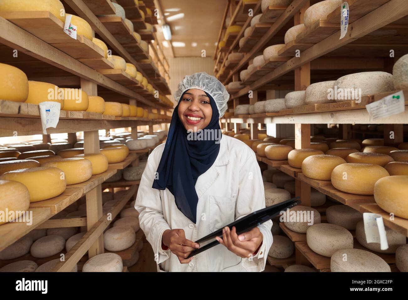 middle eastern black african muslim business woman in local cheese ...