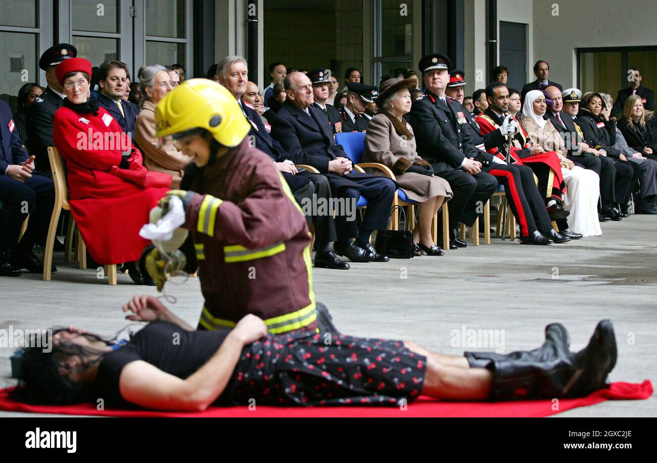 Prince Philip, Duke of Edinburgh and Queen Elizabeth II watch a fire ...