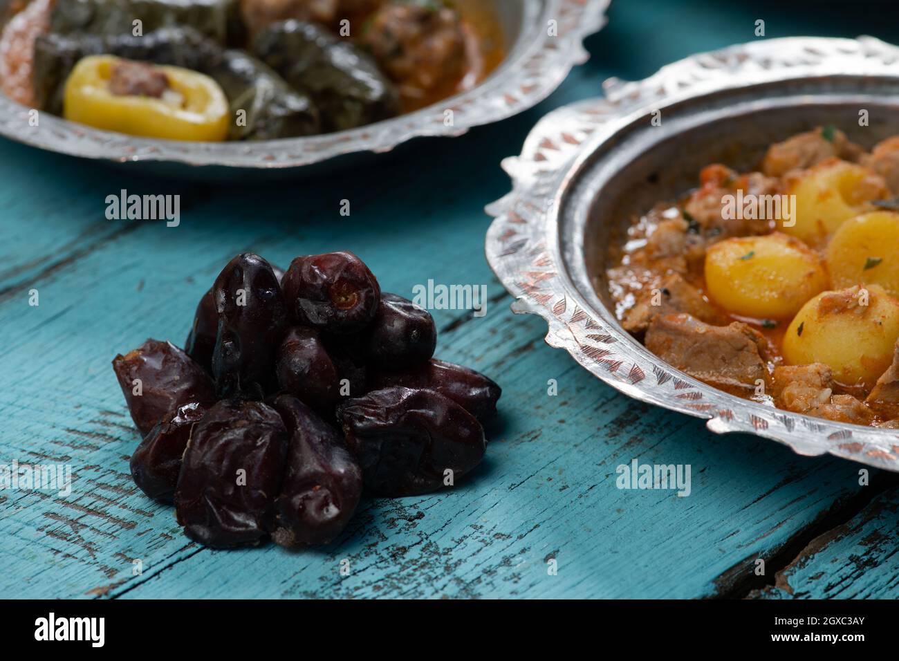 Eid Mubarak Traditional Ramadan Iftar dinner. Assorted tasty food in ...