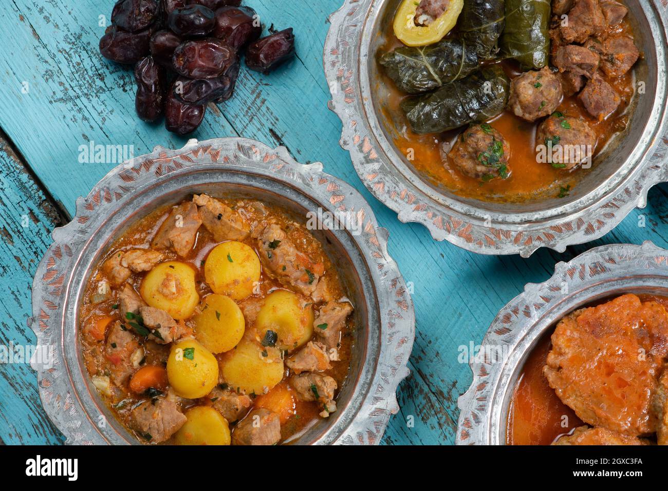 Eid Mubarak Traditional Ramadan Iftar dinner. Assorted tasty food in ...