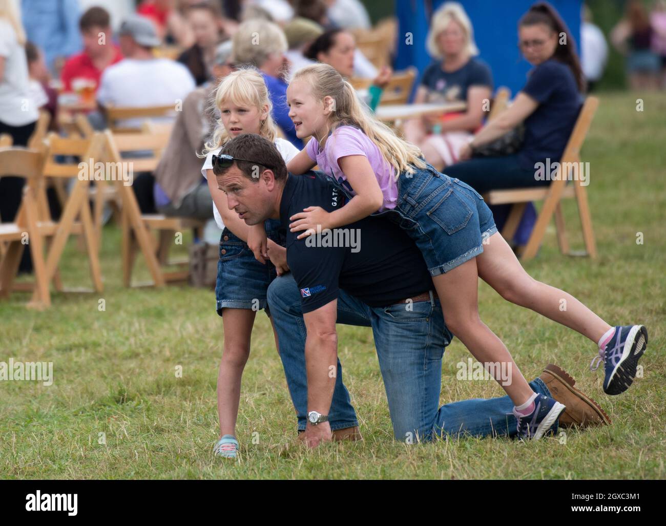 Peter Phillips with daughters Isla Phillips and Savannah Phillips ...