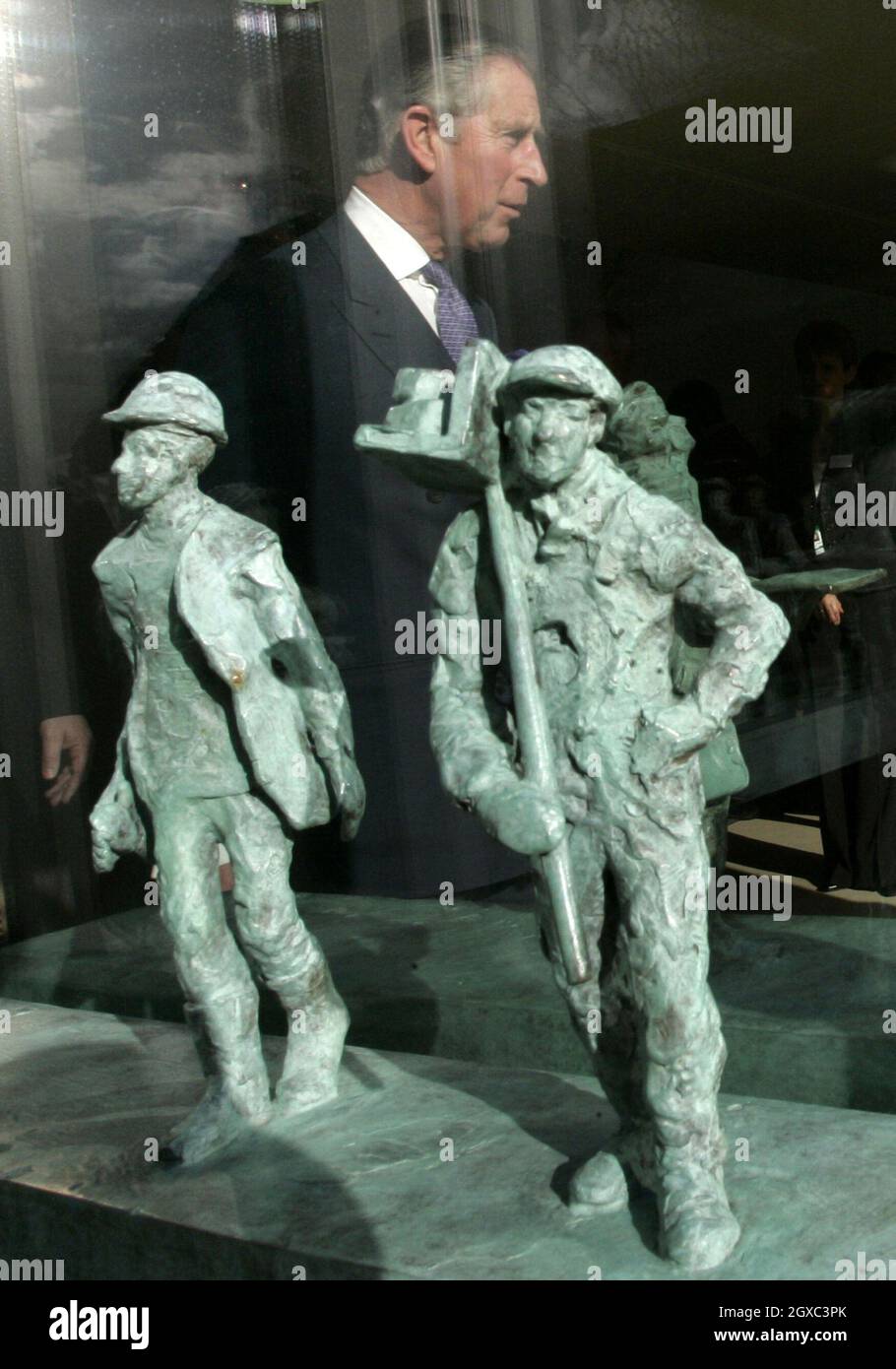 Prince Charles, Prince of Wales walks past an exhibit at the opening ...