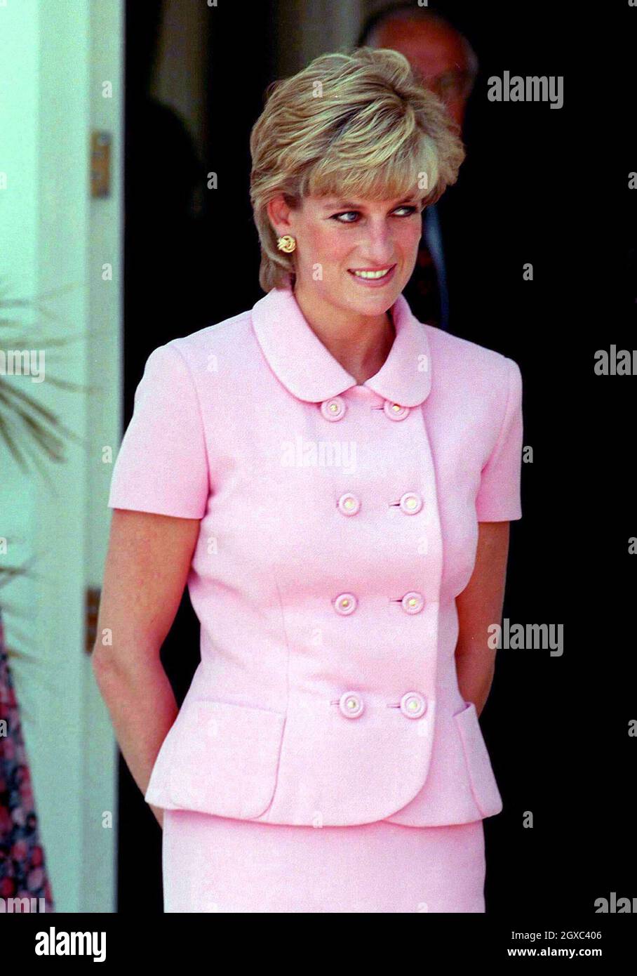 Diana, Princess of Wales, wearing a Verache pink suit during a visit to ...