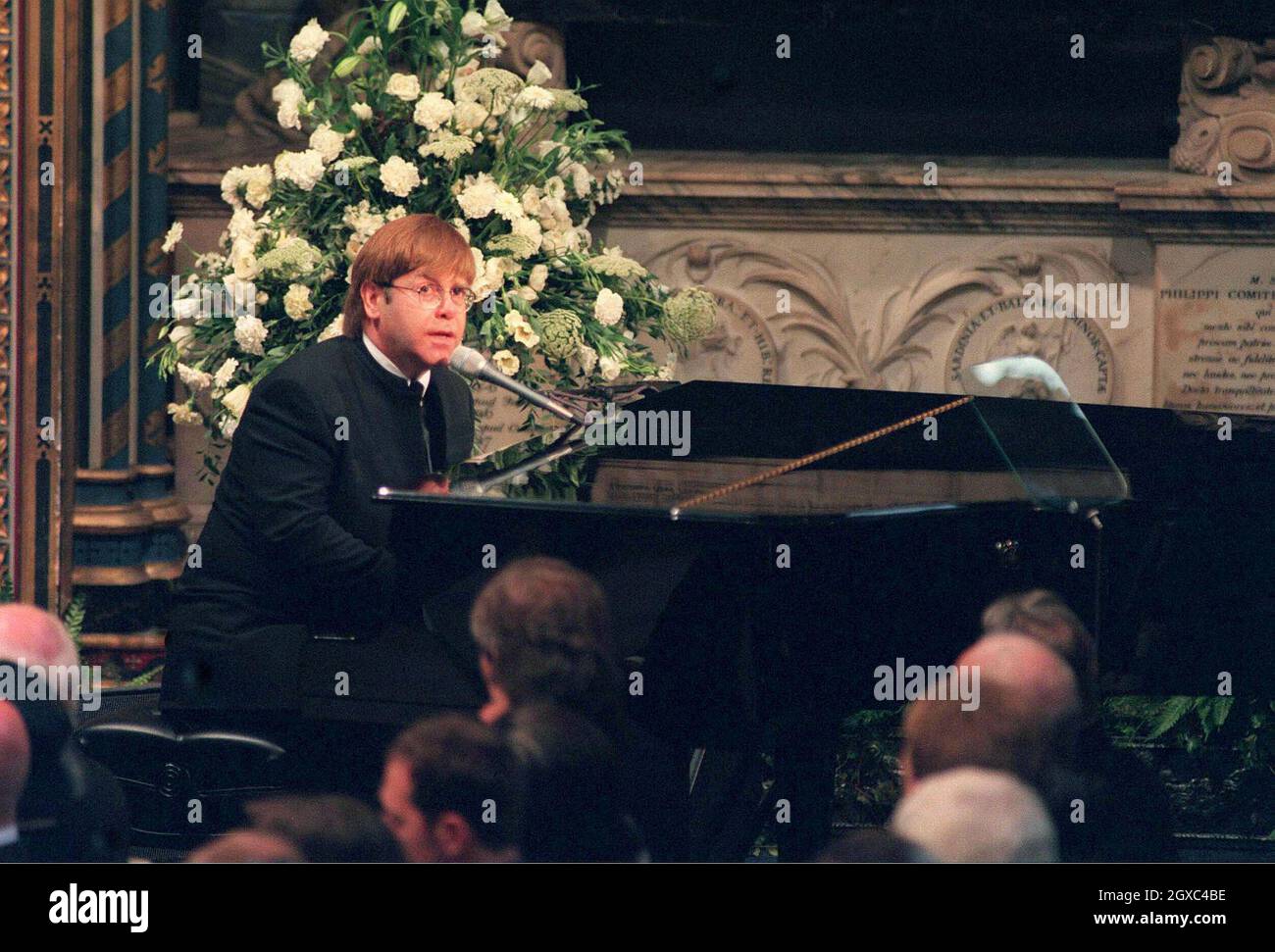 Sir Elton John sings 'Candle In The Wind' at the funeral of Diana ...