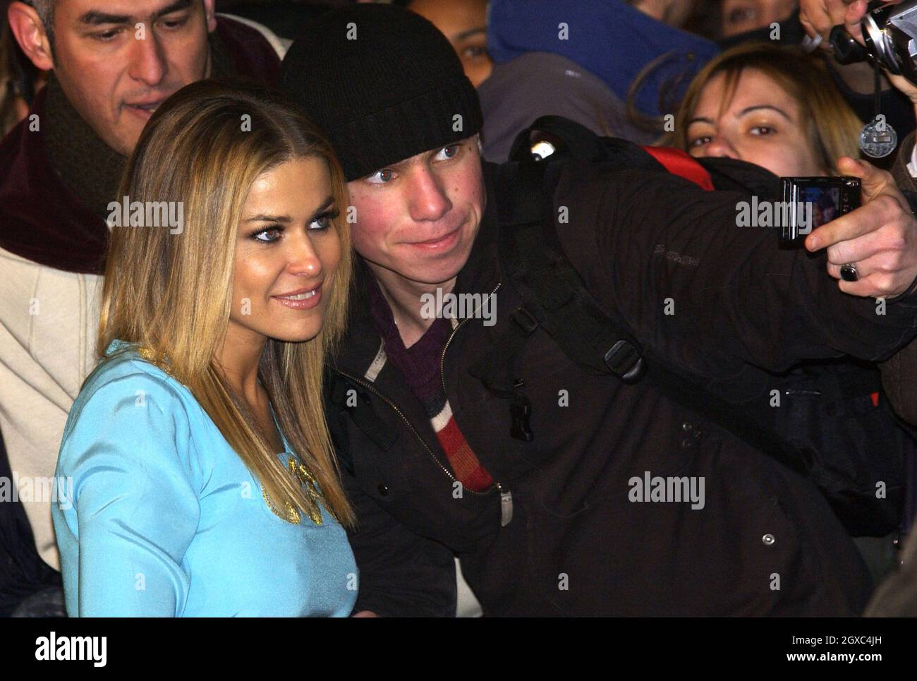 Actress Carmen Electra meets a fan whlile arrivng for the UK Premiere ...