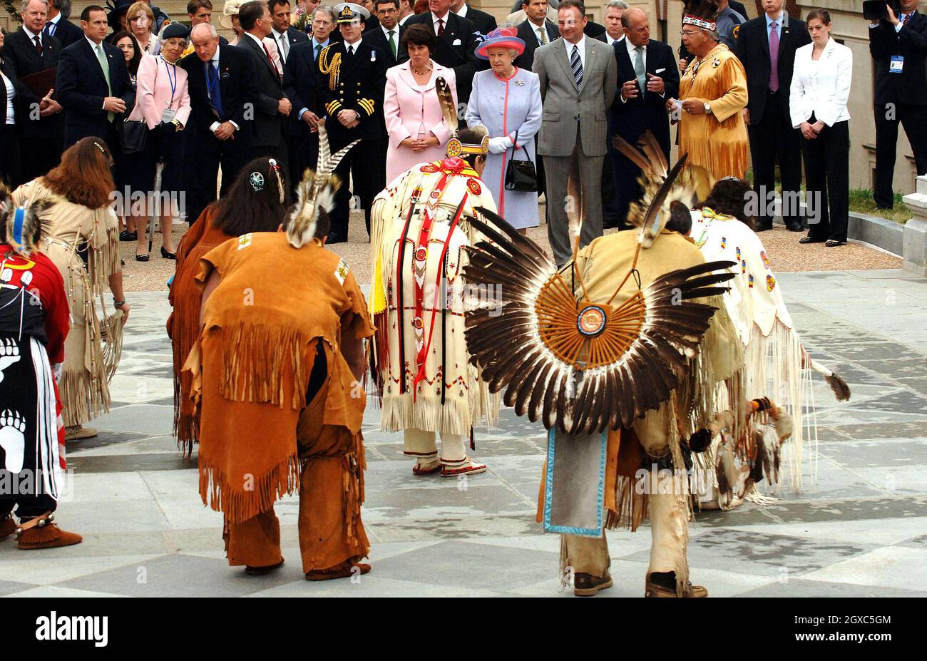 Queen Elizabeth II and Prince Philip, Duke of Edinburgh watch a Native ...