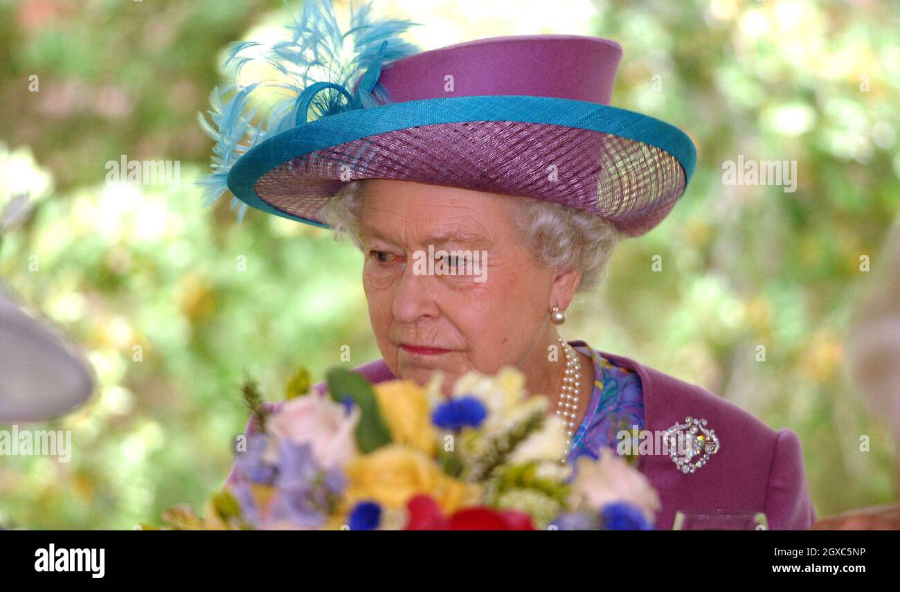 Queen Elizabeth II attends a luncheon at the Govenor's House in ...