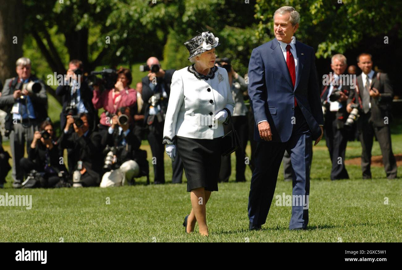 Queen Elizabeth II and George Bush, President of the USA, walk through ...