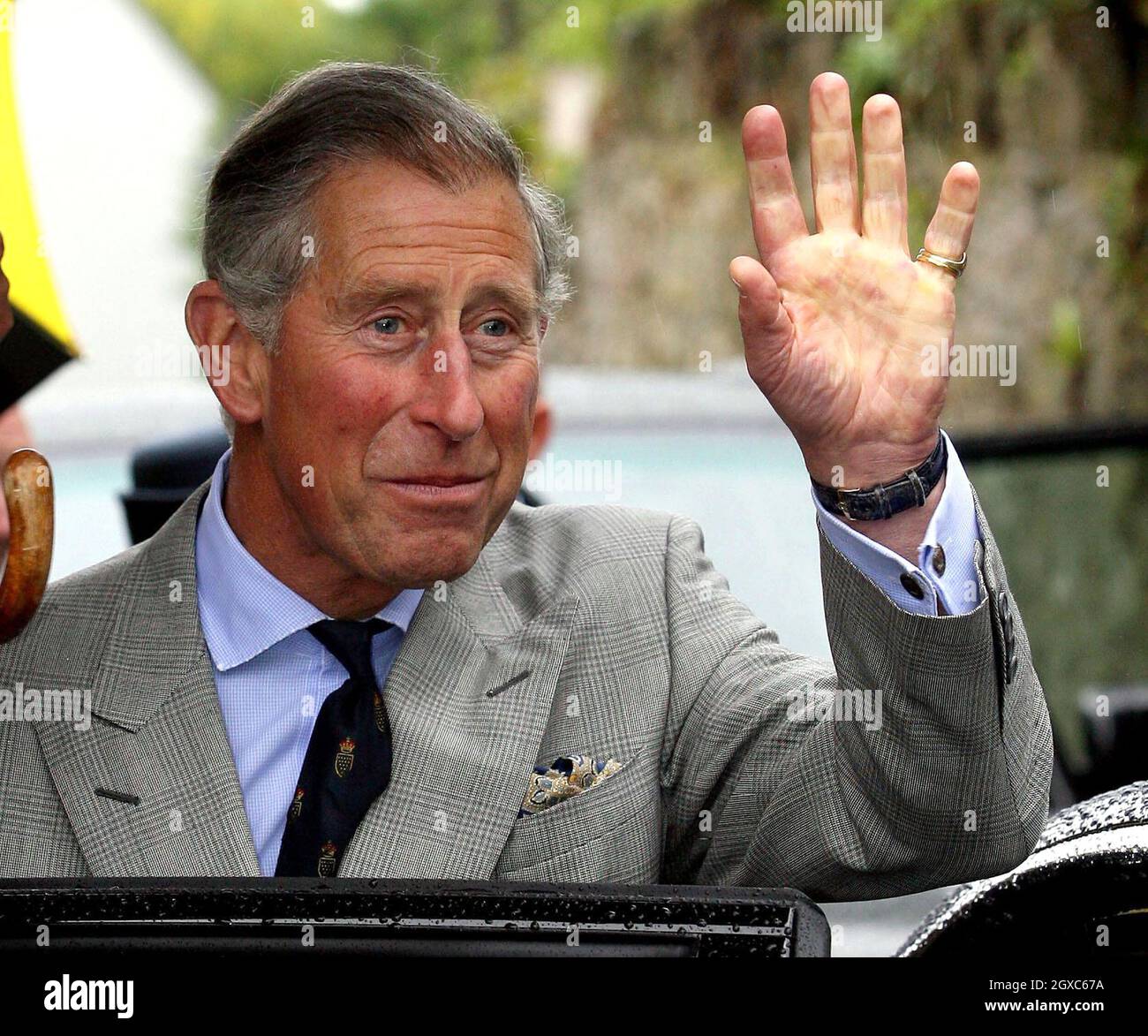 Prince Charles, Prince of Wales waves goodbye after touring the ...