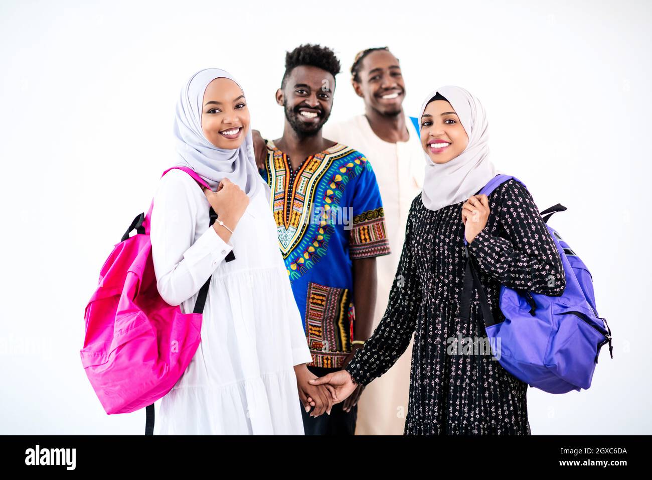 group portrait of happy african students standing together against ...