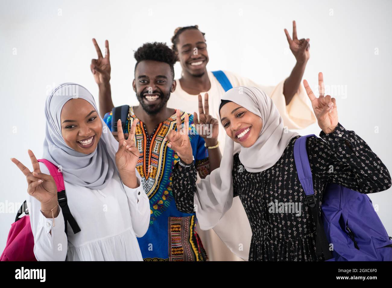 group of happy african students having conversation and team meeting ...