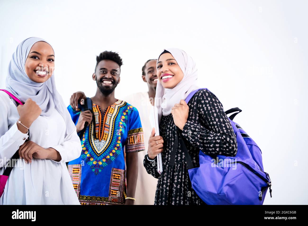 group portrait of happy african students standing together against ...