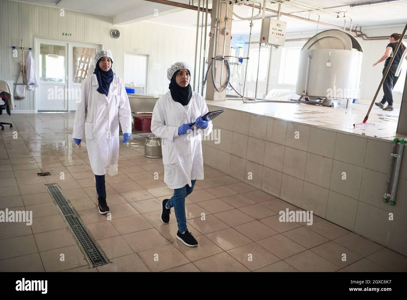 middle eastern black african muslim female business woman team in local ...