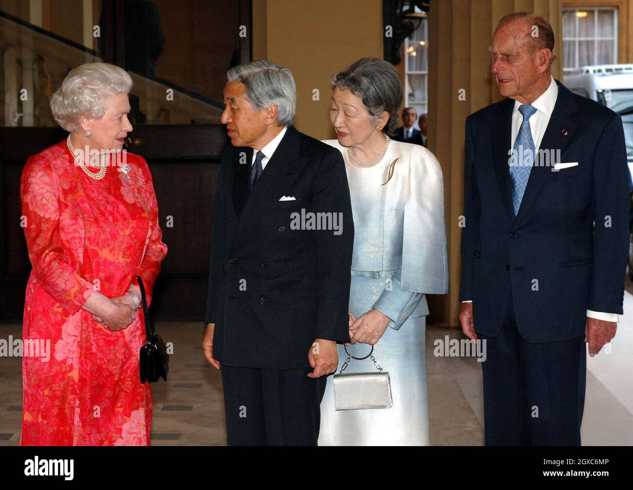 Queen Elizabeth II and Prince Philip, Duke of Edinburgh greet Emperor ...