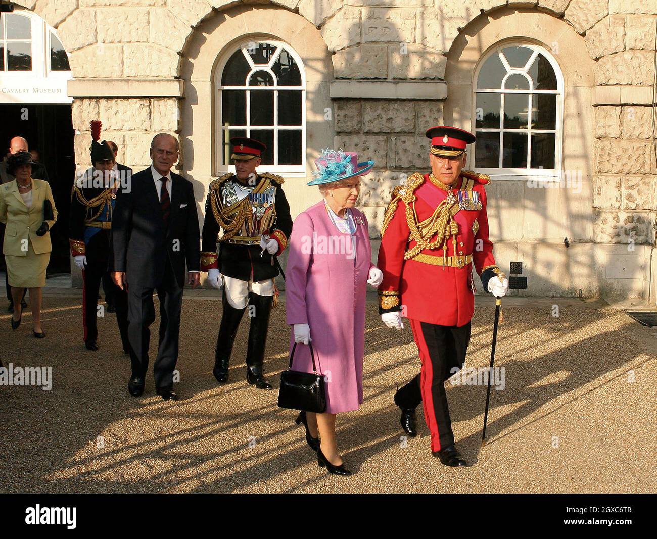Queen Elizabeth ll walks with with Lord Guthrie, former Chief of ...