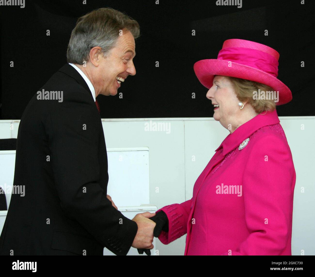 Prime Minister Tony Blair shakes hands with Baroness Margaret Thatcher ...