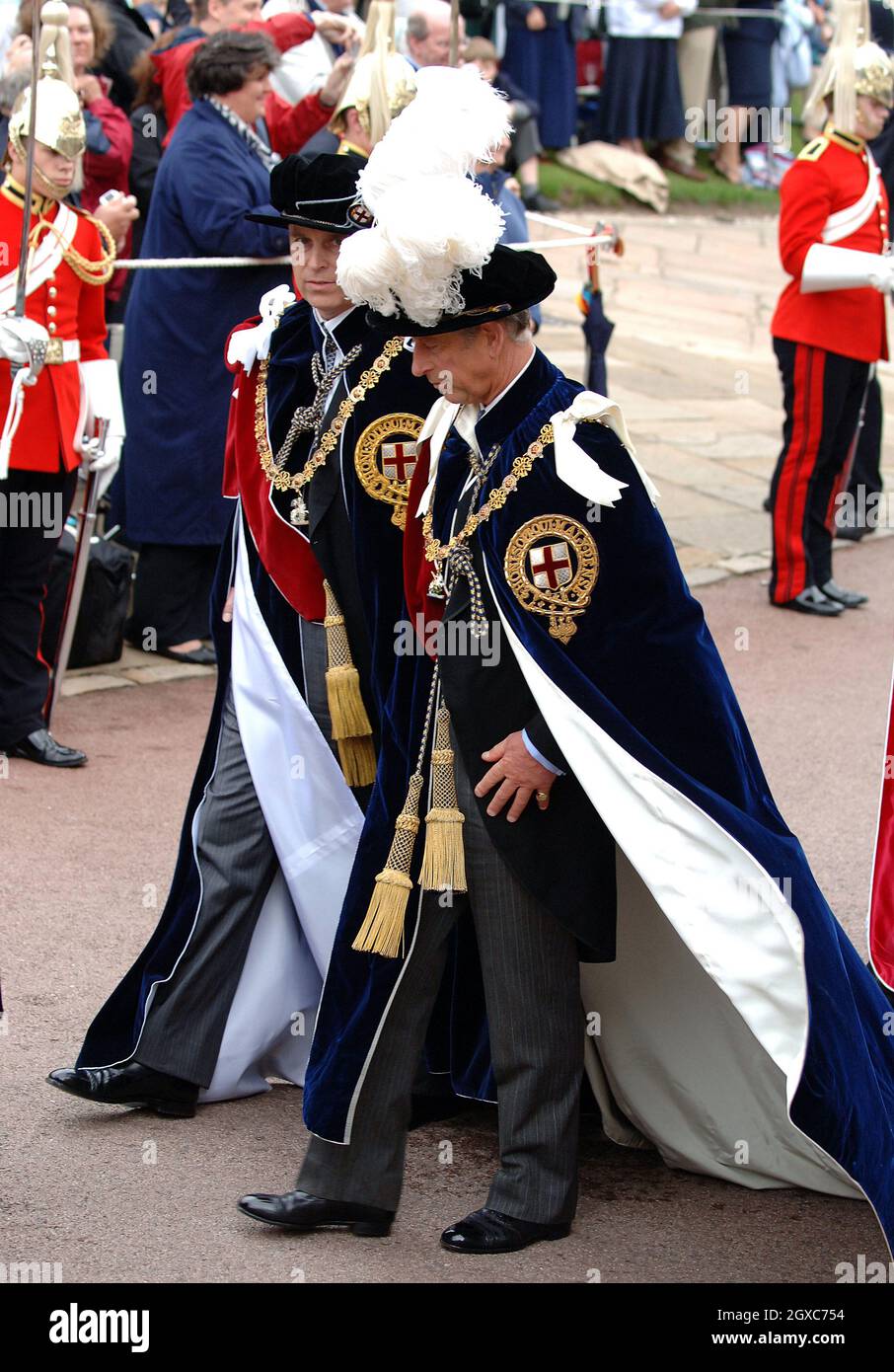 Queen Elizabeth ll and Prince Philip, Duke of Edinburgh walk in a ...