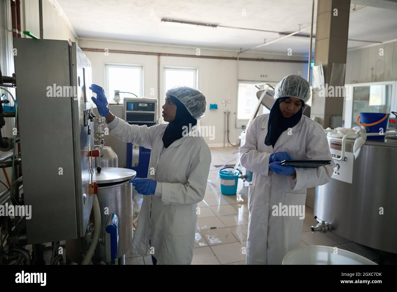 middle eastern black african muslim female business woman team in local ...
