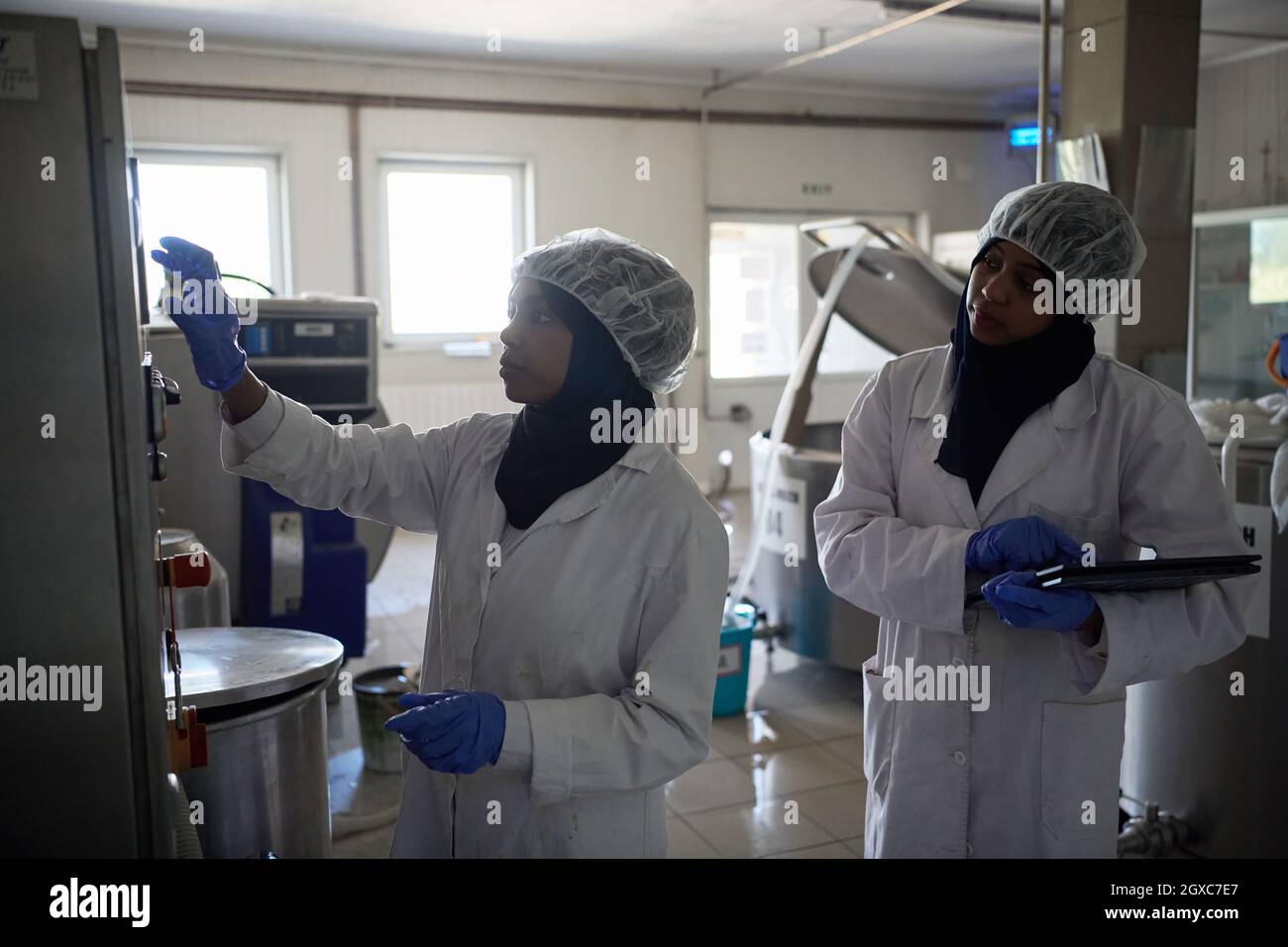 middle eastern black african muslim female business woman team in local ...