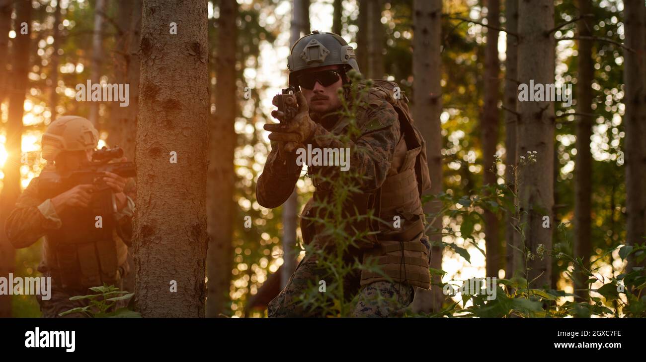 Modern warfare Soldiers Squad Running as Team in Battle Formation Stock ...