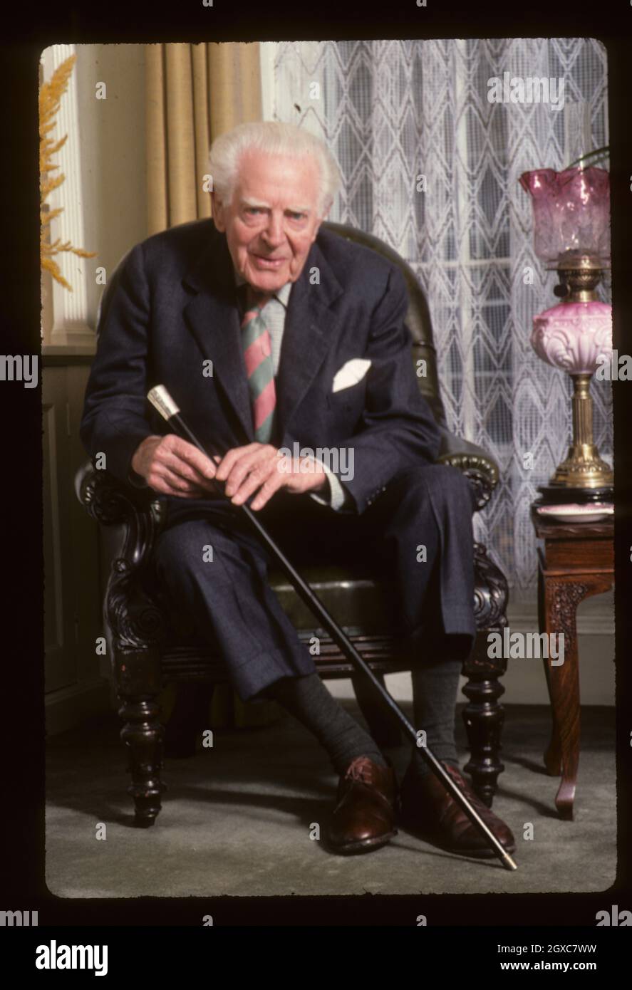 Playwright Ben Travers relaxes at his London home on May 01, 1977 Stock ...