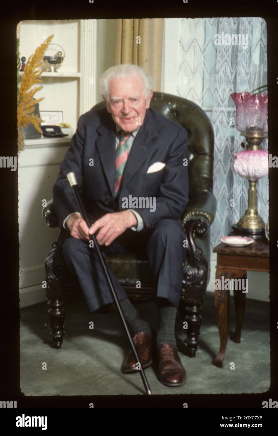 Playwright Ben Travers relaxes at his London home on May 01, 1977 Stock ...