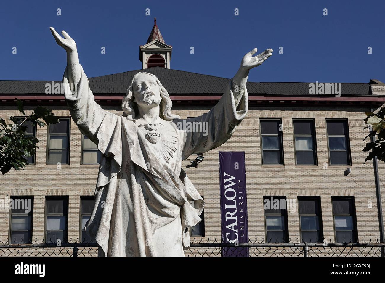 A statue stands in front of the Carlow University, a private Catholic ...
