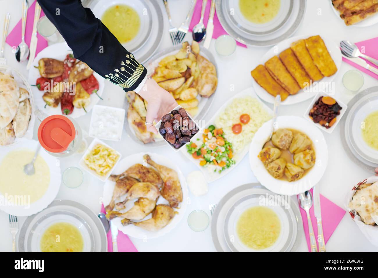 Eid Mubarak Muslim family having Iftar dinner eating dates to break ...