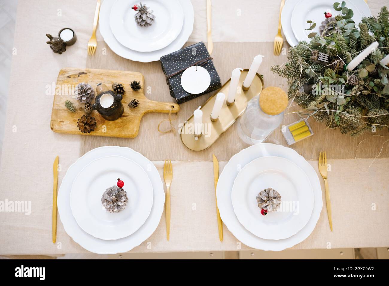 Christmas decorated table for dinner with a beautiful setting Stock ...