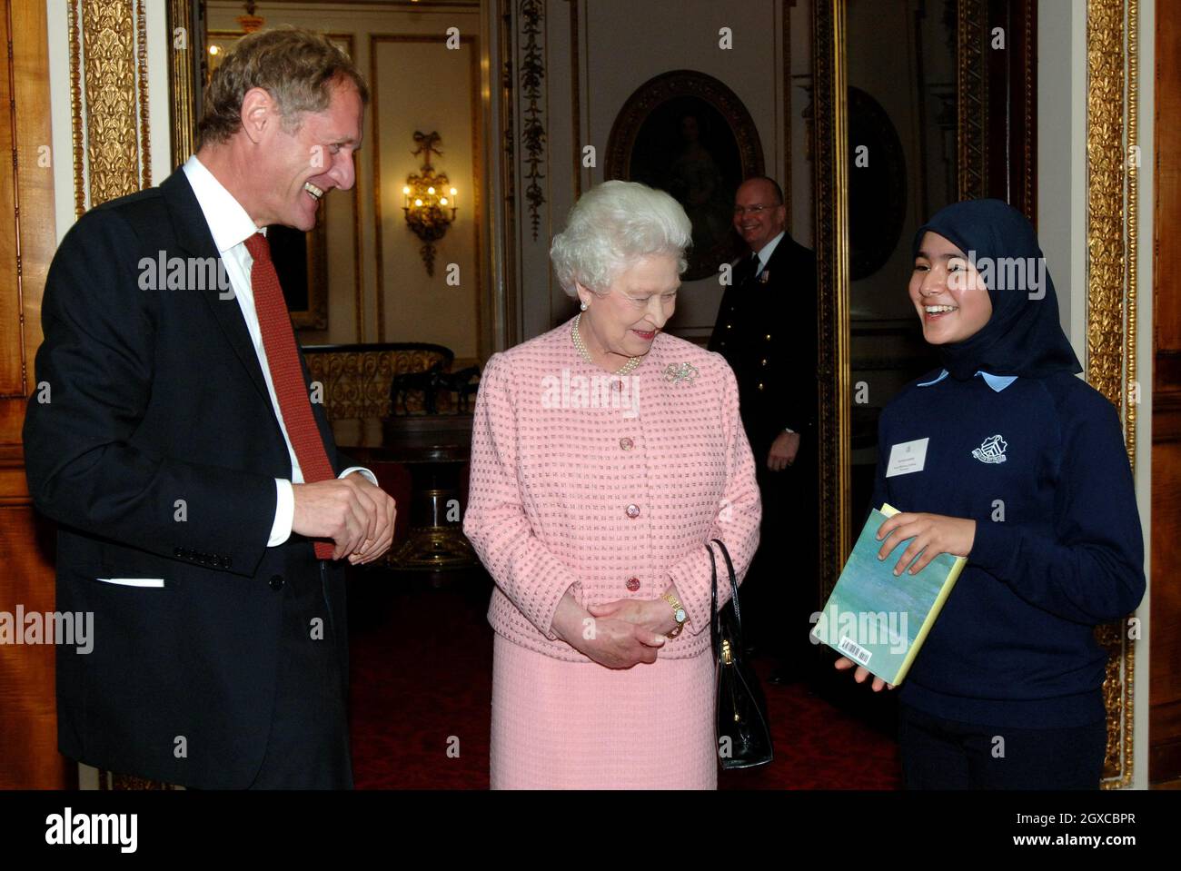 Queen Elizabeth II and Poet Laureate Andrew Motion present 14 year old ...
