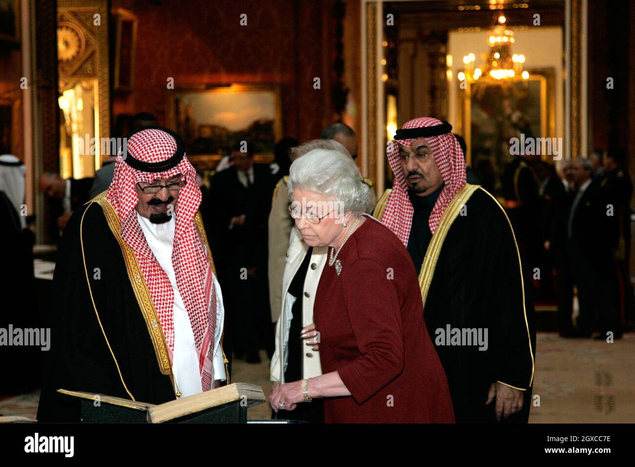 Queen Elizabeth ll shows King Abdullah of Saudi Arabia items from the ...