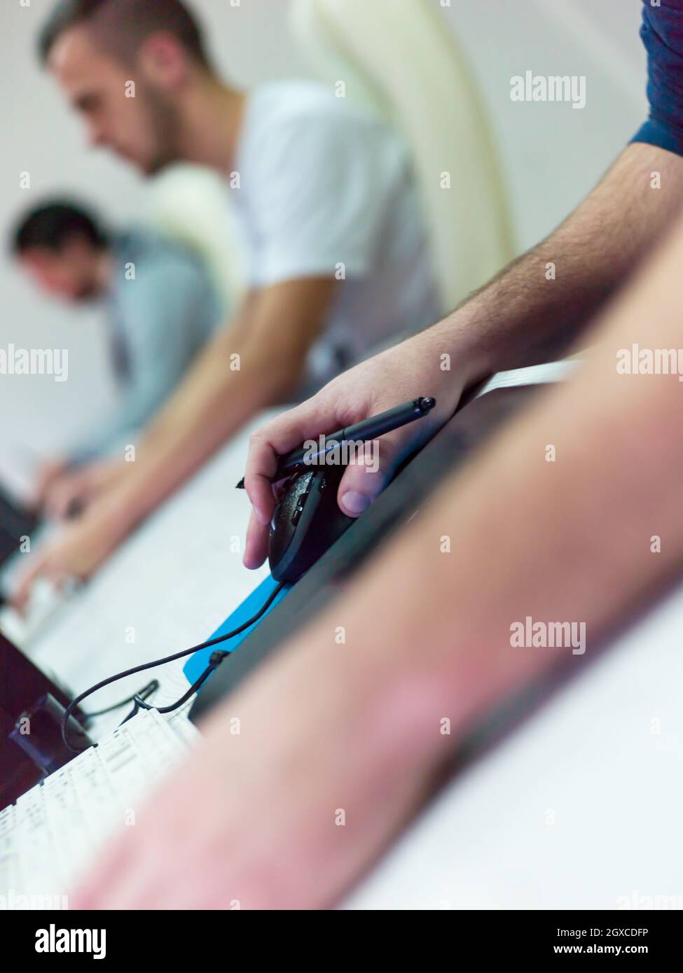 Closeup of Graphic Designer Working at Workplace. Guy Sitting at Table ...