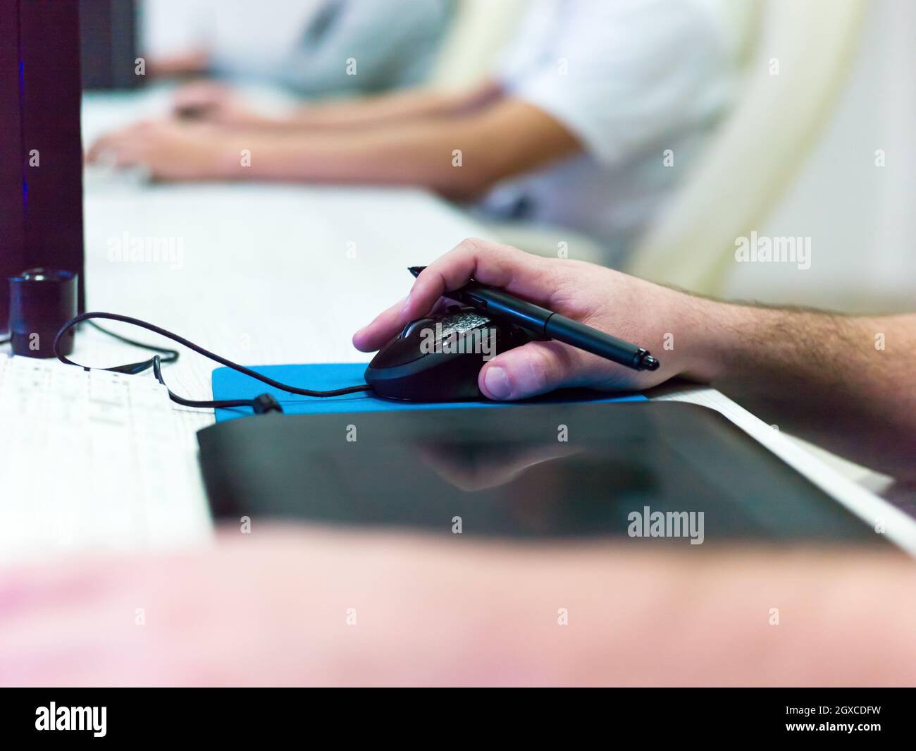 Closeup of Graphic Designer Working at Workplace. Guy Sitting at Table ...
