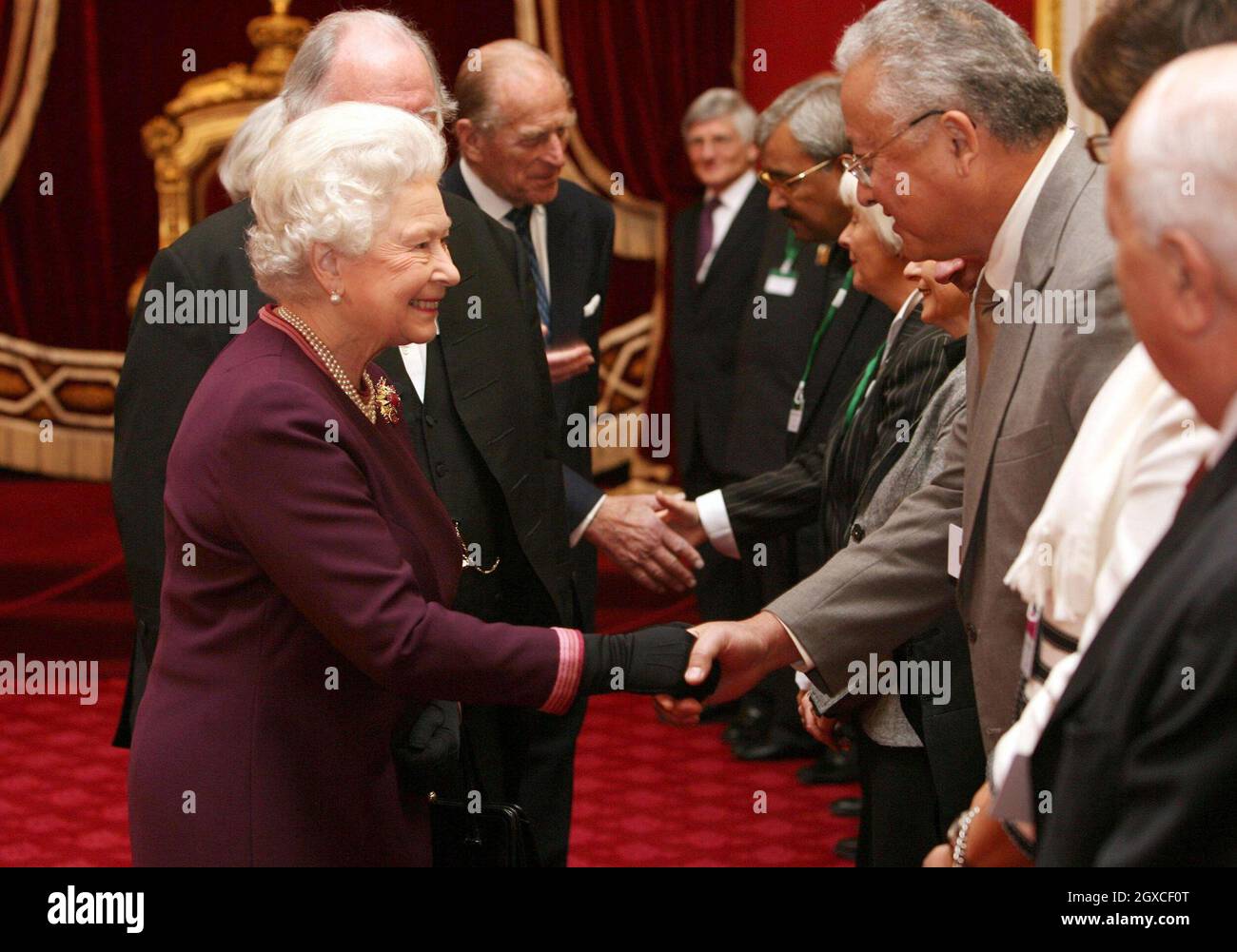 Queen Elizabeth II greets the Speaker of the House of Representatives ...