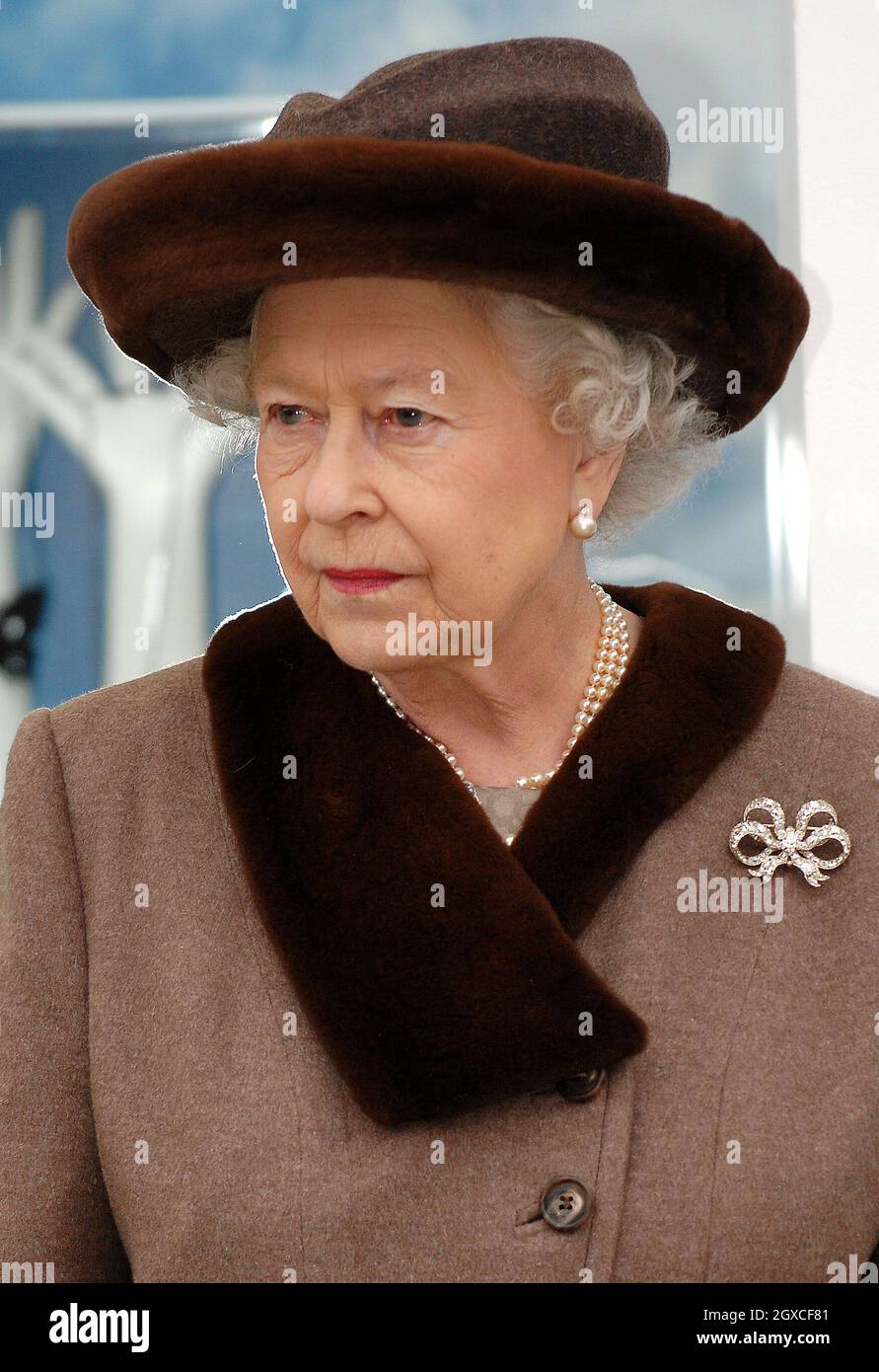 Queen Elizabeth II looks anxious following the breaking story regarding ...