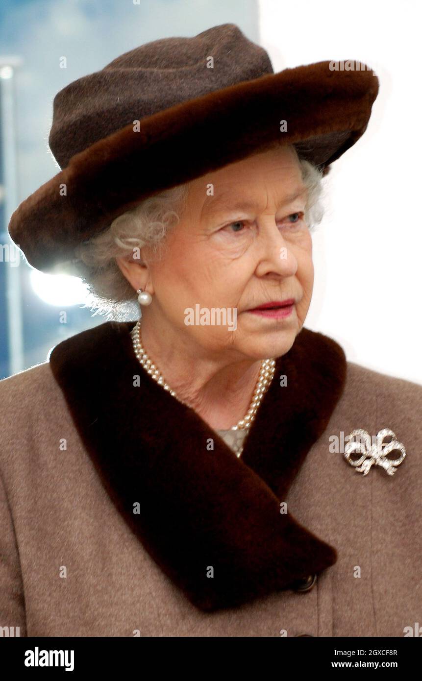 Queen Elizabeth II looks anxious following the breaking story regarding ...
