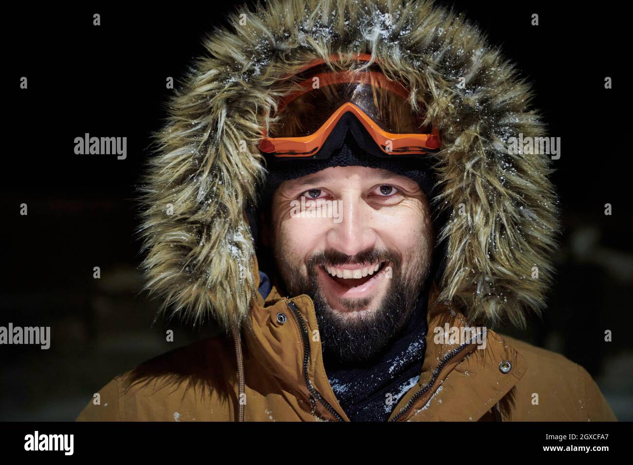 portrait local authentic eskimo man at winter in stormy weather wearing ...