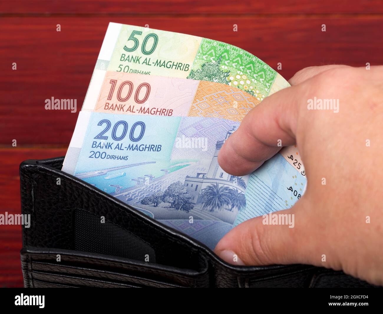 Moroccan money - Dirham in the black wallet Stock Photo - Alamy