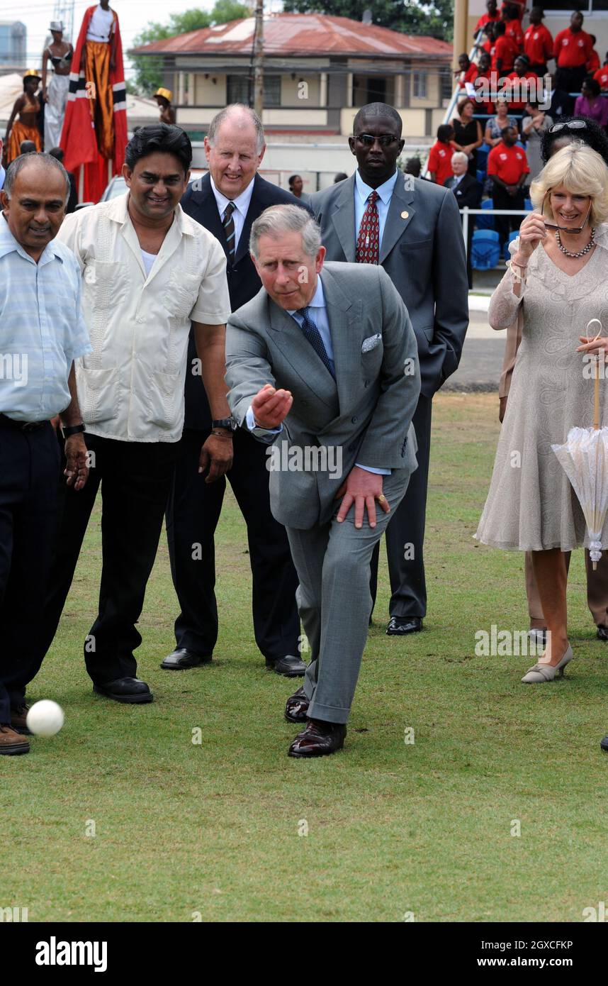 The Prince of Wales tries his hand with a cricket bat on a visit to the ...