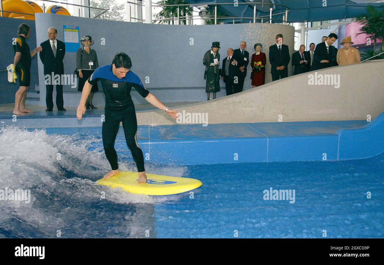 Queen Elizabeth II and Prince Philip, Duke of Edinburgh look on as a ...