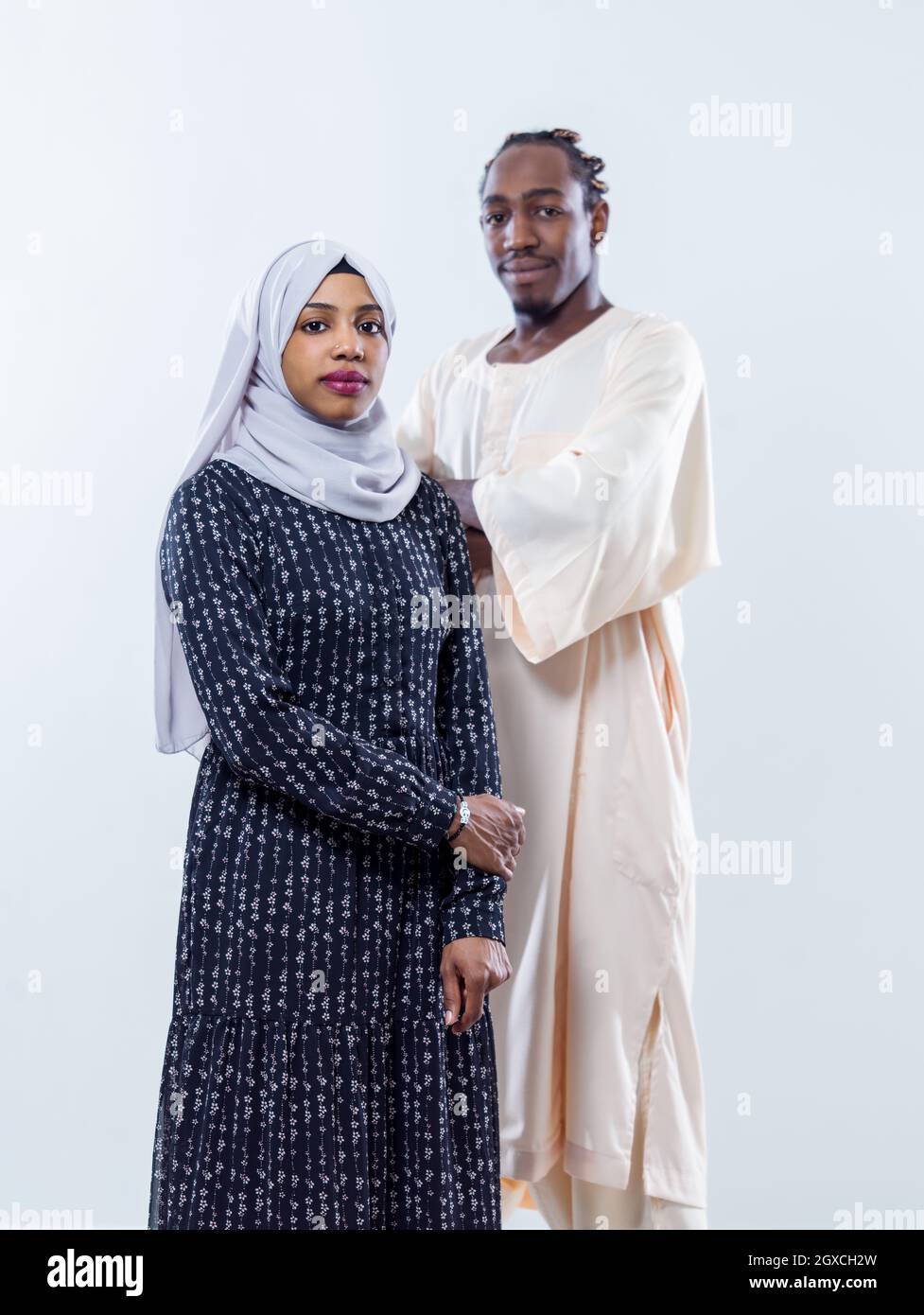 Portrait Of Young African Modern Muslim Couple Wearing Traditional