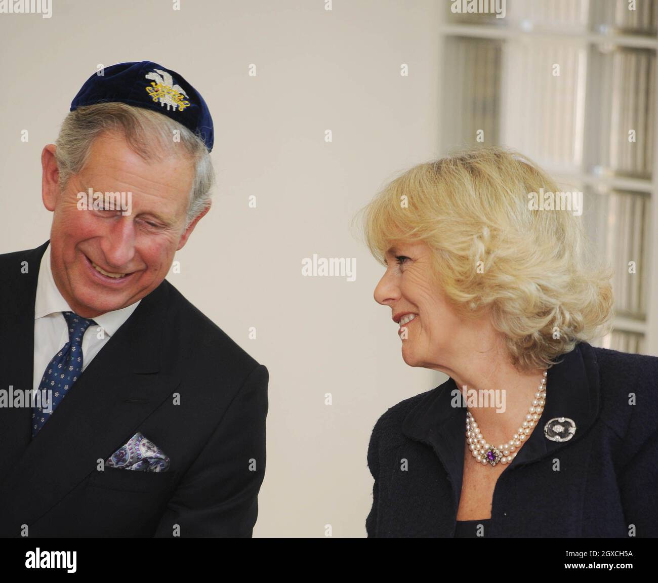 Prince Charles, Prince of Wales, wearing a Jewish yarmulka, and Camilla ...