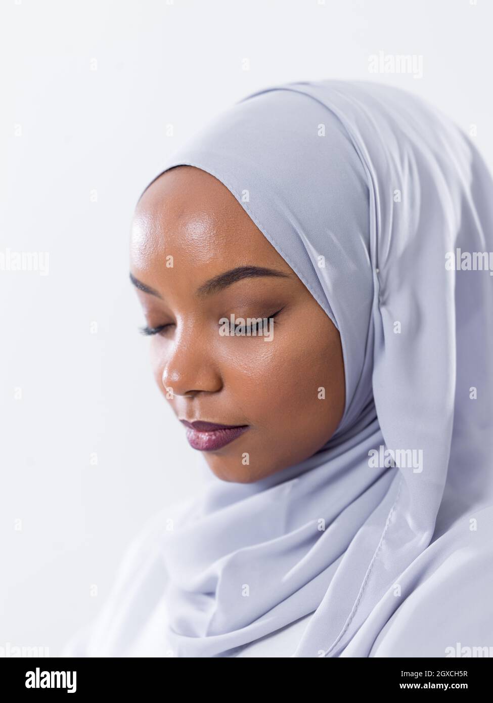 portrait of young modern muslim afro beauty wearing traditional islamic ...