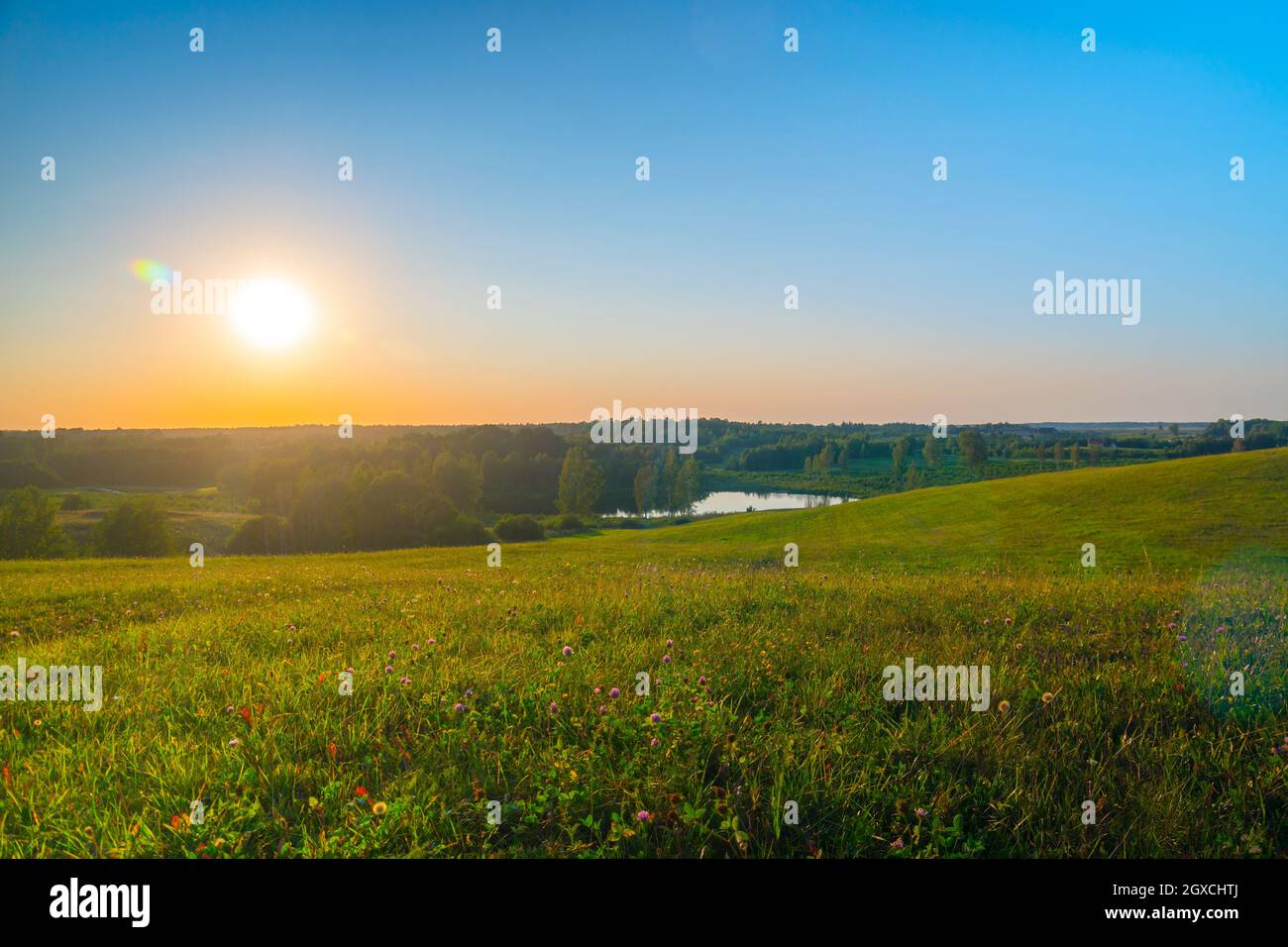 Sunset and summer landscape Stock Photo - Alamy