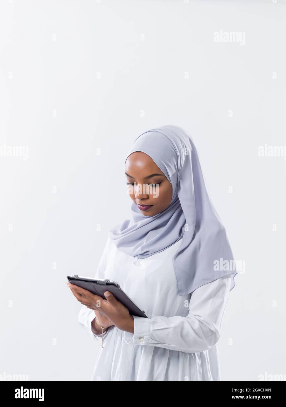 young modern muslim african business woman using tablet computer ...