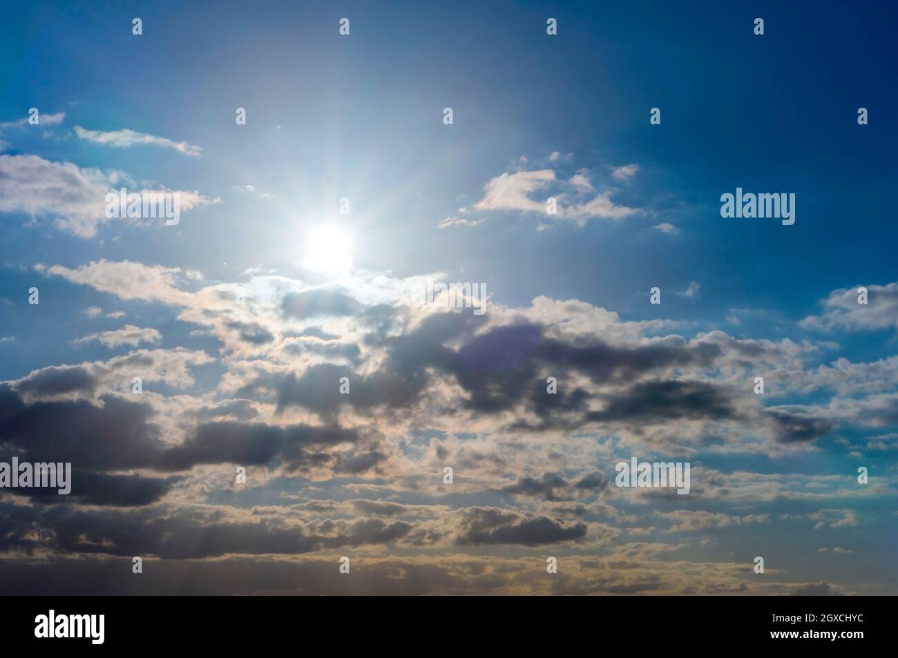 Sunset sky, sun and dramatic clouds Stock Photo - Alamy