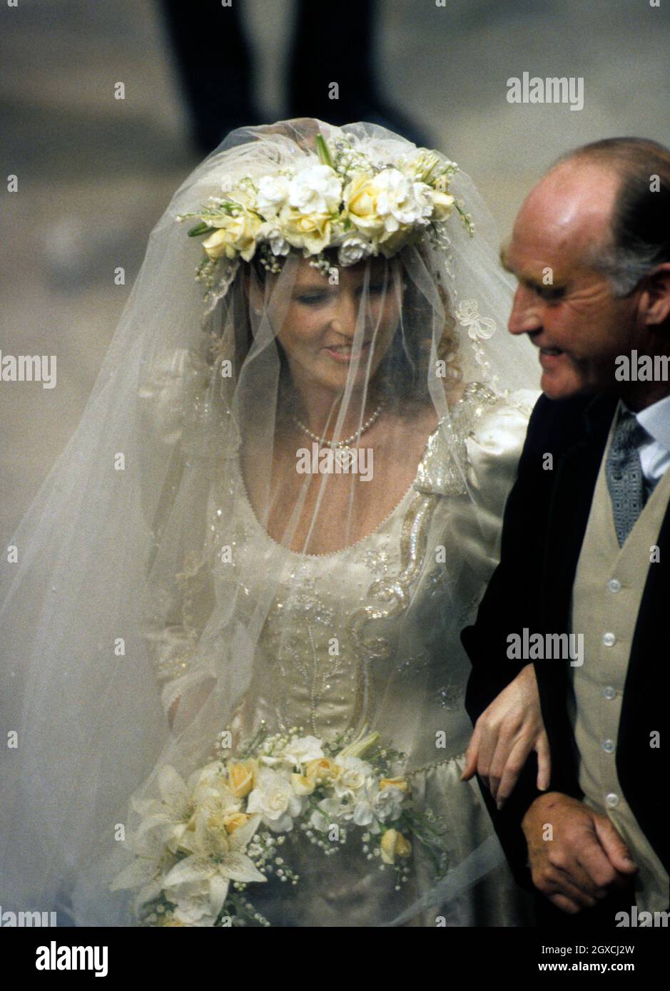 Sarah Ferguson on the arm of her father, Major Ronald Ferguson at ...