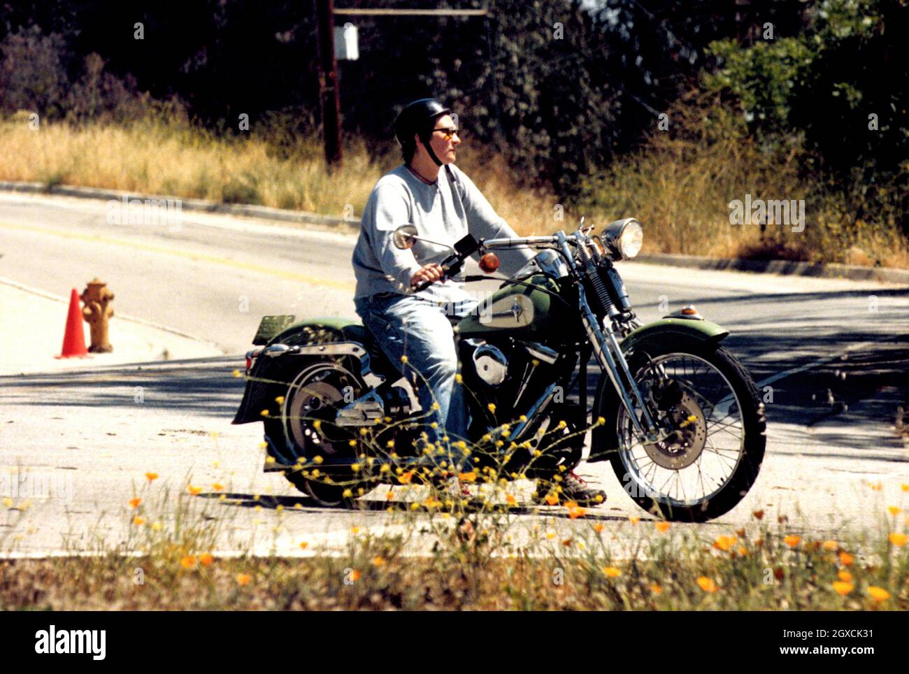 Canadian singer K.D Lang on her Harley Davidson in LA Stock Photo - Alamy