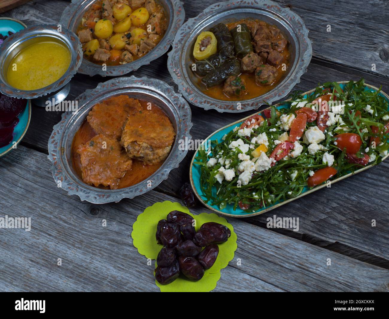 Eid Mubarak Traditional Ramadan Iftar dinner. Assorted tasty food in ...
